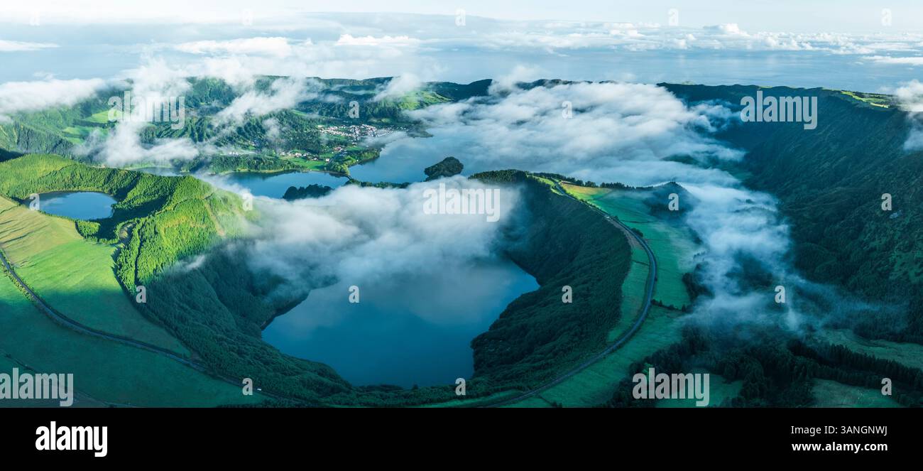 Aerial view of Seven Lakes with lush green hills and volcanic crater ...