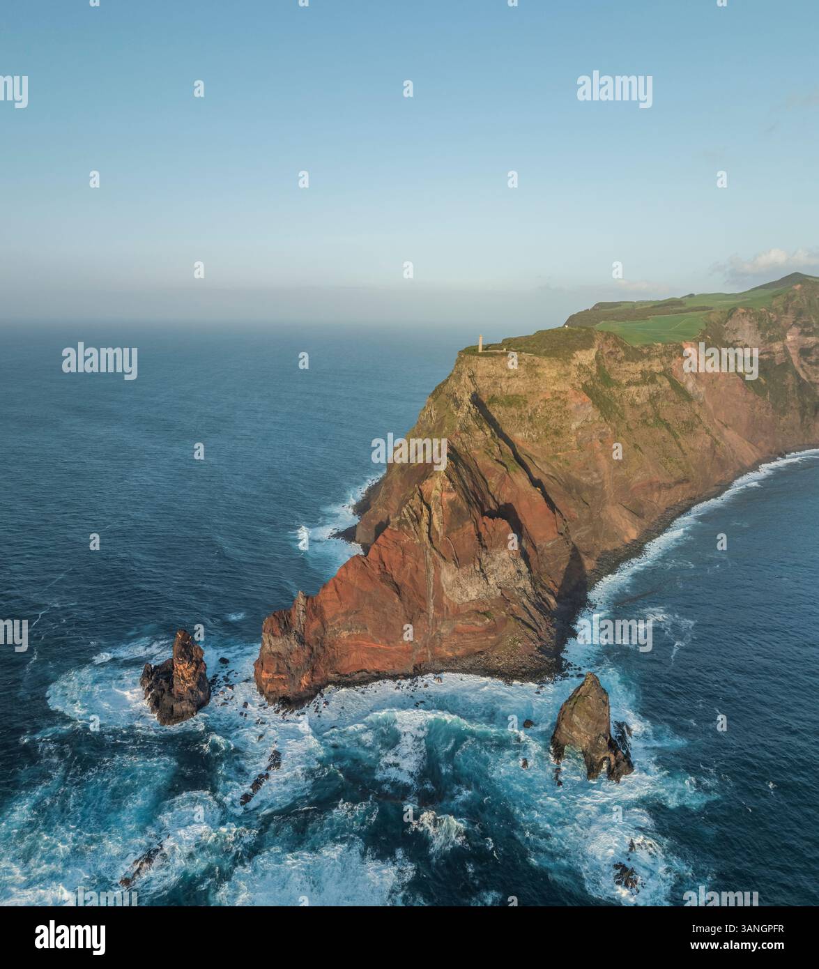 Aerial view of Sao Jorge Island with Farol dos Rosais lighthouse ...