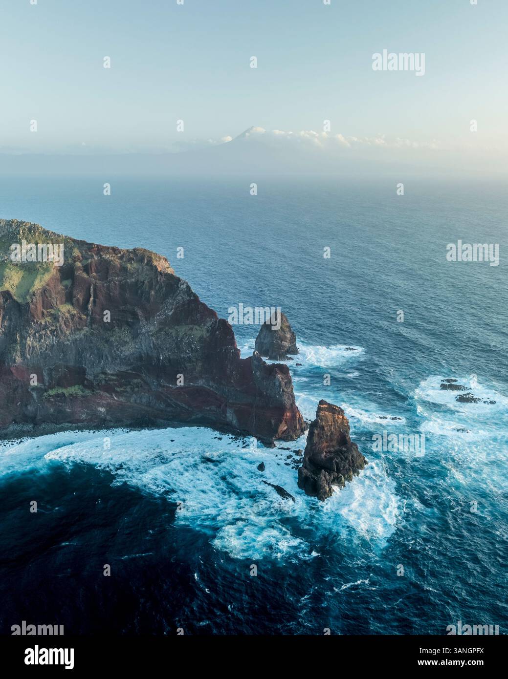 Aerial view of Sao Jorge Island with Farol dos Rosais lighthouse ...