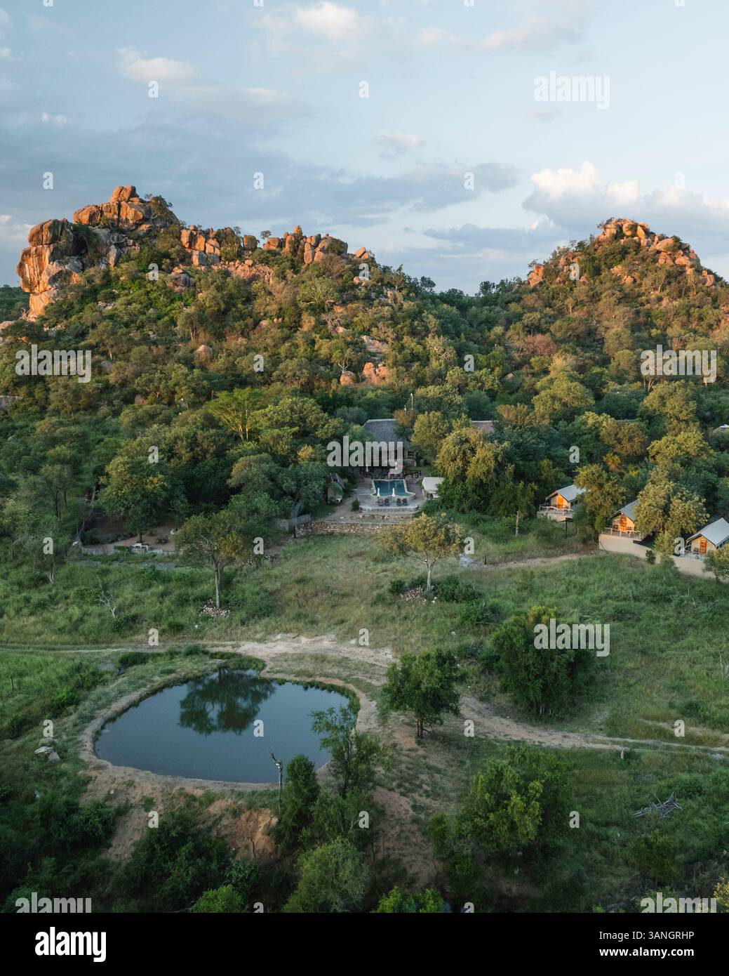 Aerial view of a luxury resort building with swimming pool in the ...