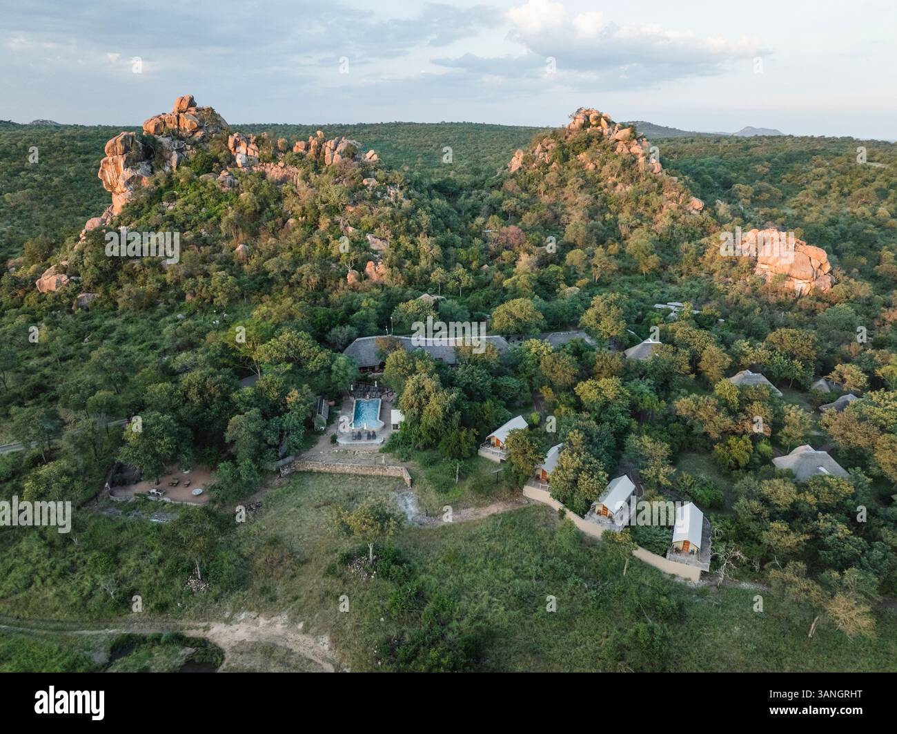Aerial view of a luxury resort building with swimming pool in the ...