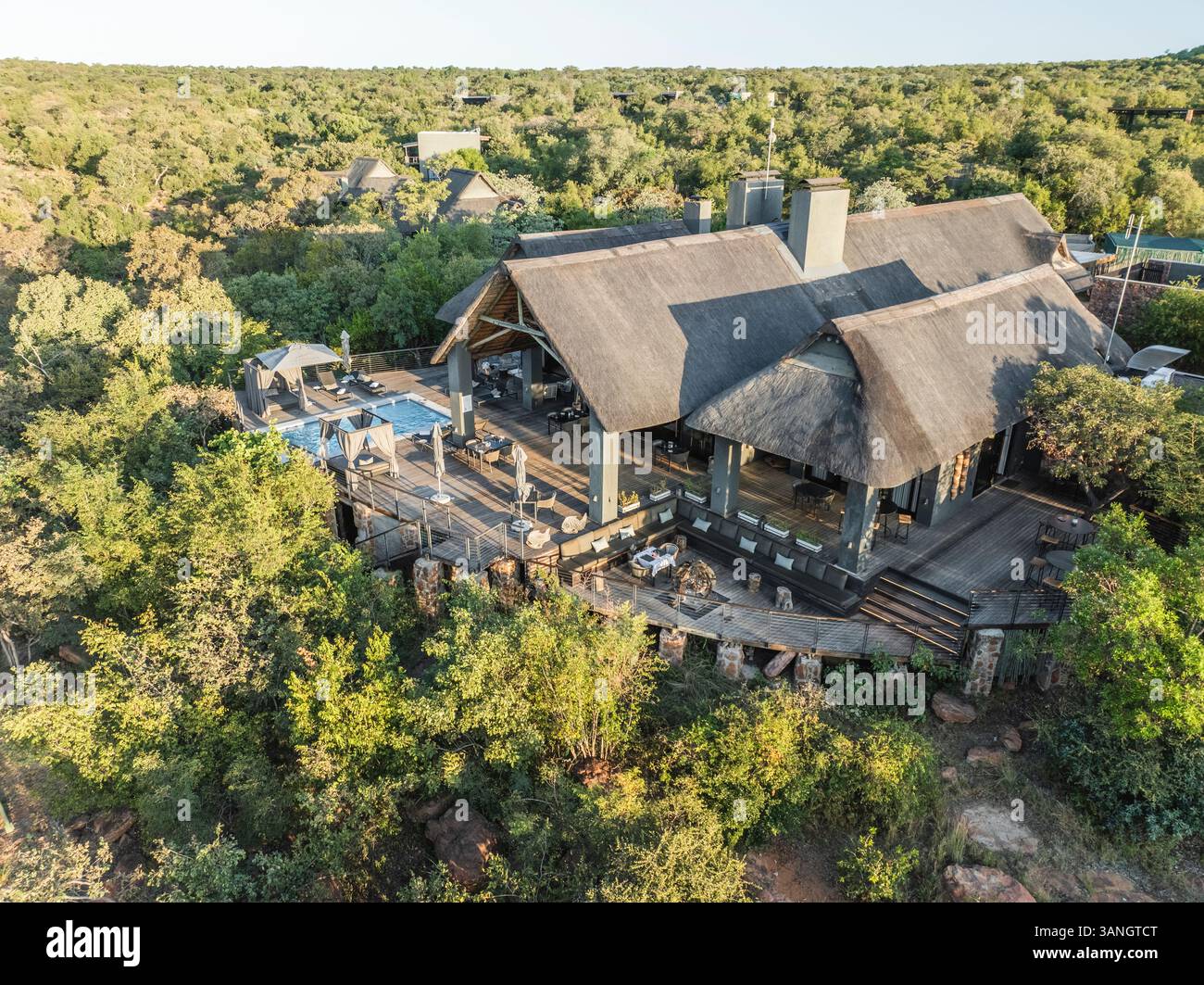 Aerial view of a luxury resort building with swimming pool in the ...
