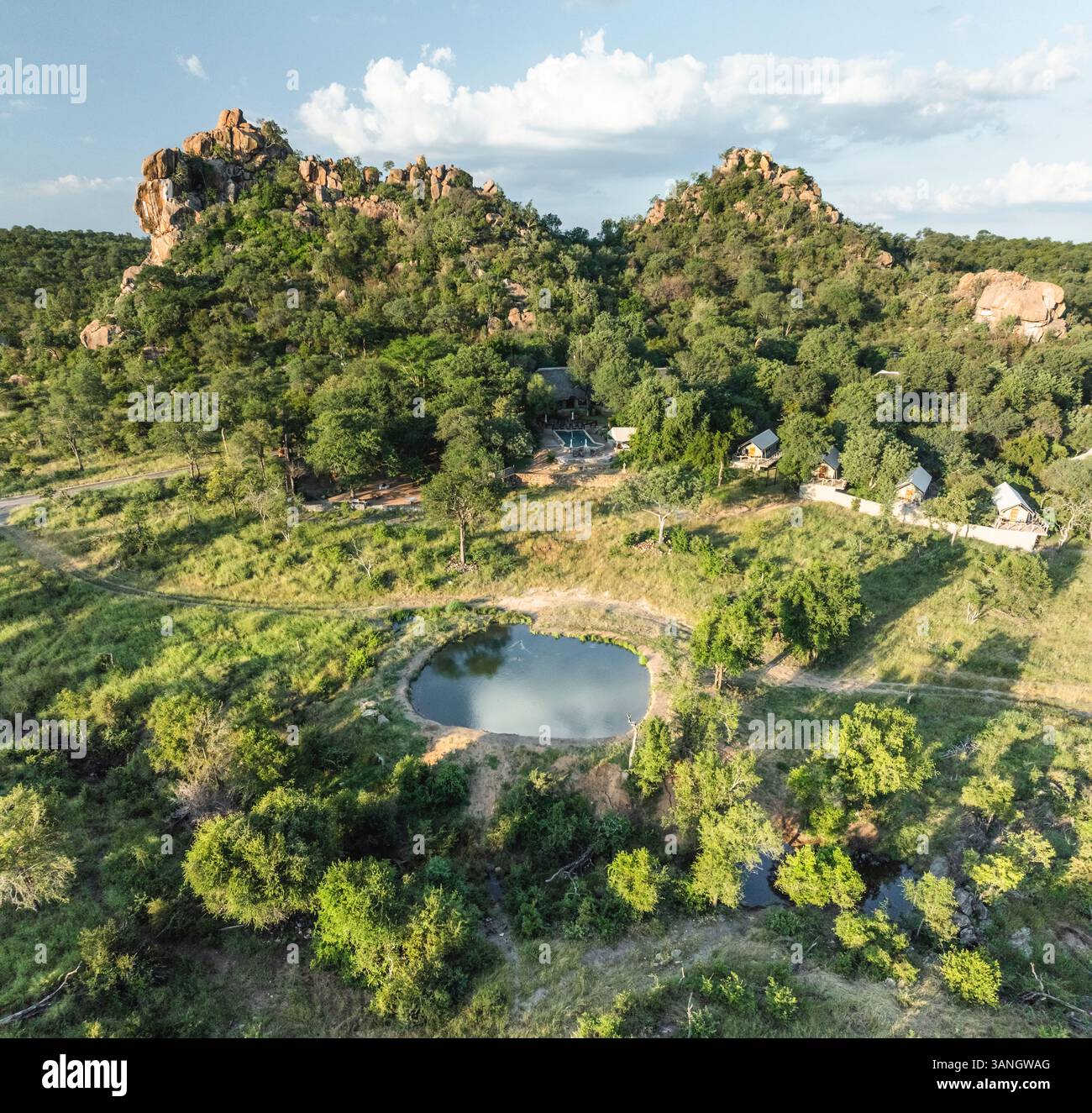 Aerial view of a luxury resort building with swimming pool in the ...