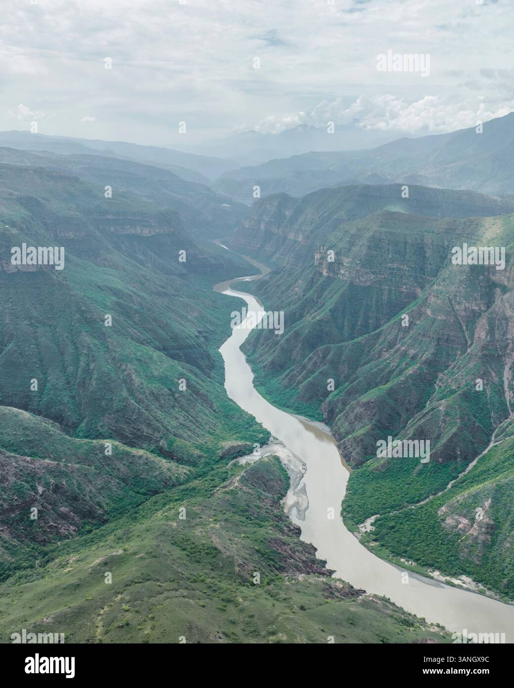 Aerial view of Sogamoso River across the mountain valley in Los Santos ...