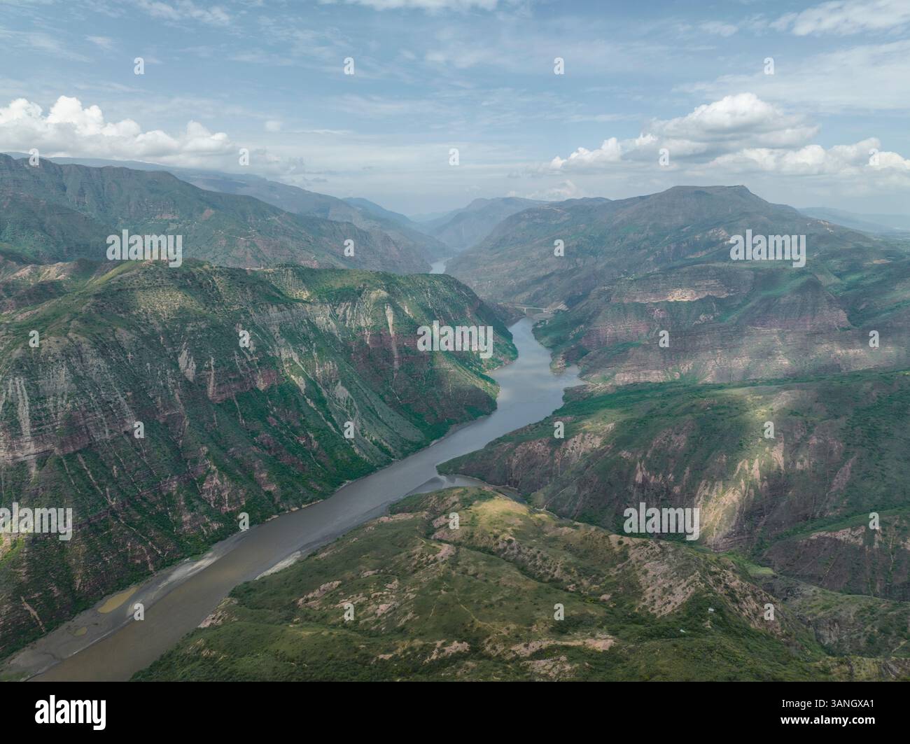 Aerial view of Sogamoso River across the mountain valley in Los Santos ...