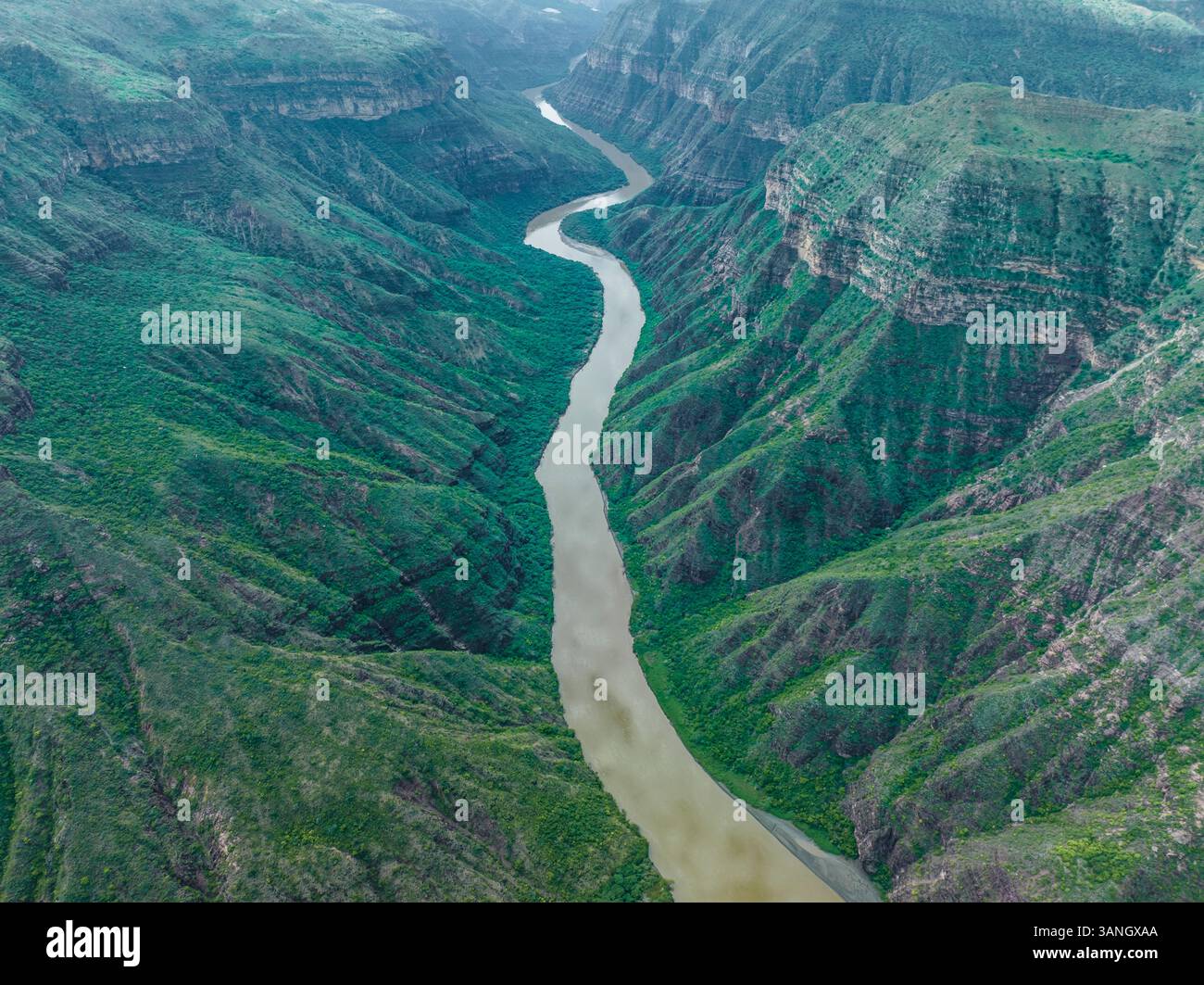 Aerial view of Sogamoso River across the mountain valley in Los Santos ...