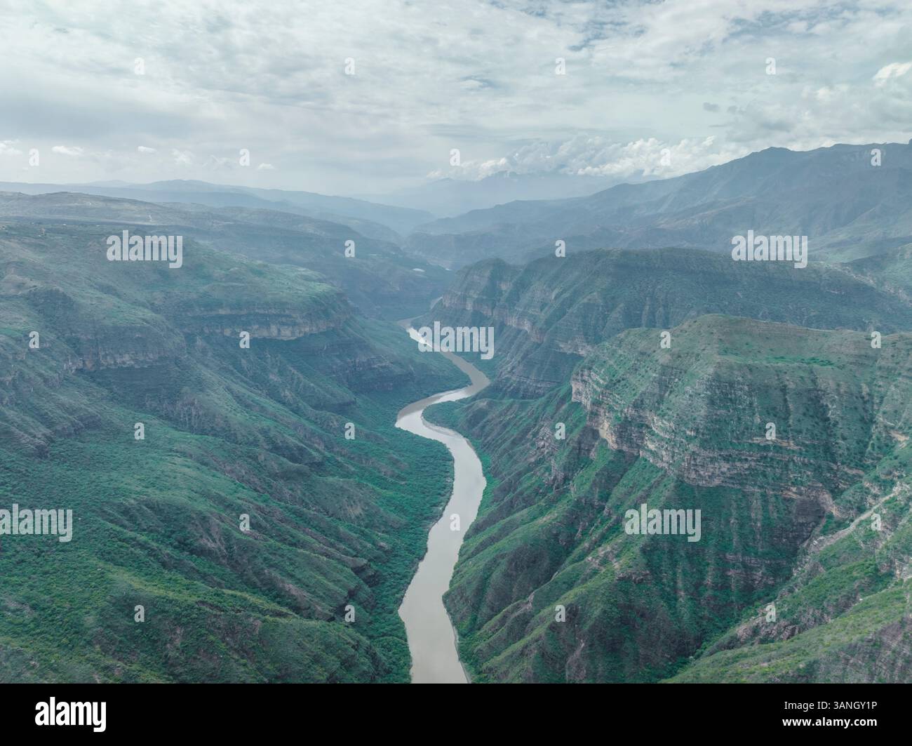 Aerial view of Sogamoso River across the mountain valley in Los Santos ...
