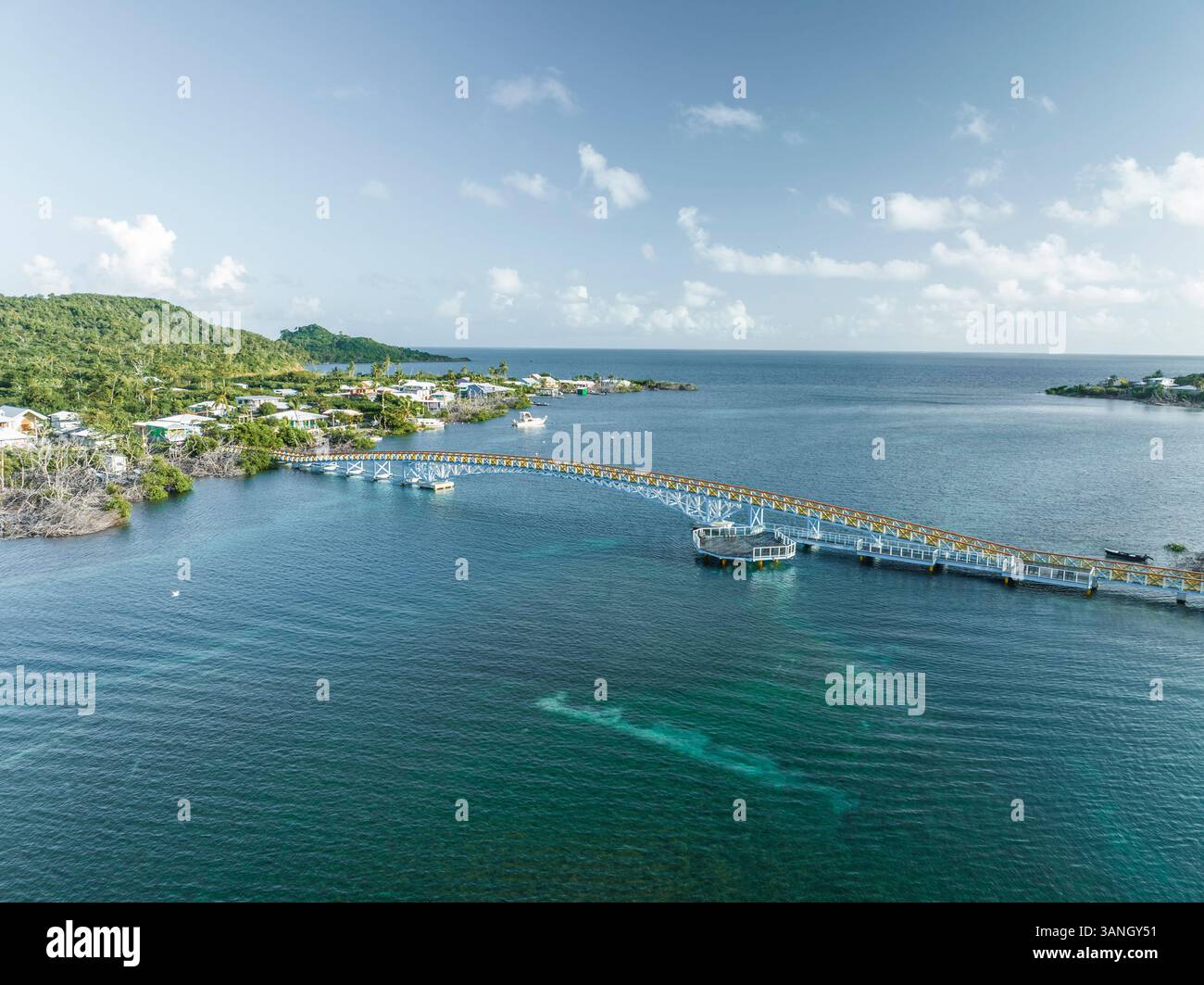 Aerial view of a suspended bridge crossing the bay connecting the two ...