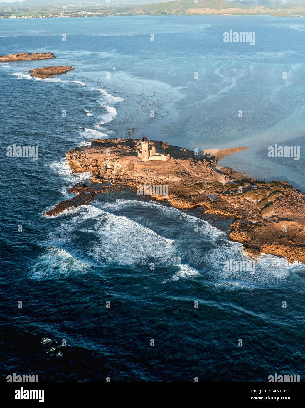 Aerial view of Ile aux Fouquets lighthouse on Ile au Phare, Grand Port ...