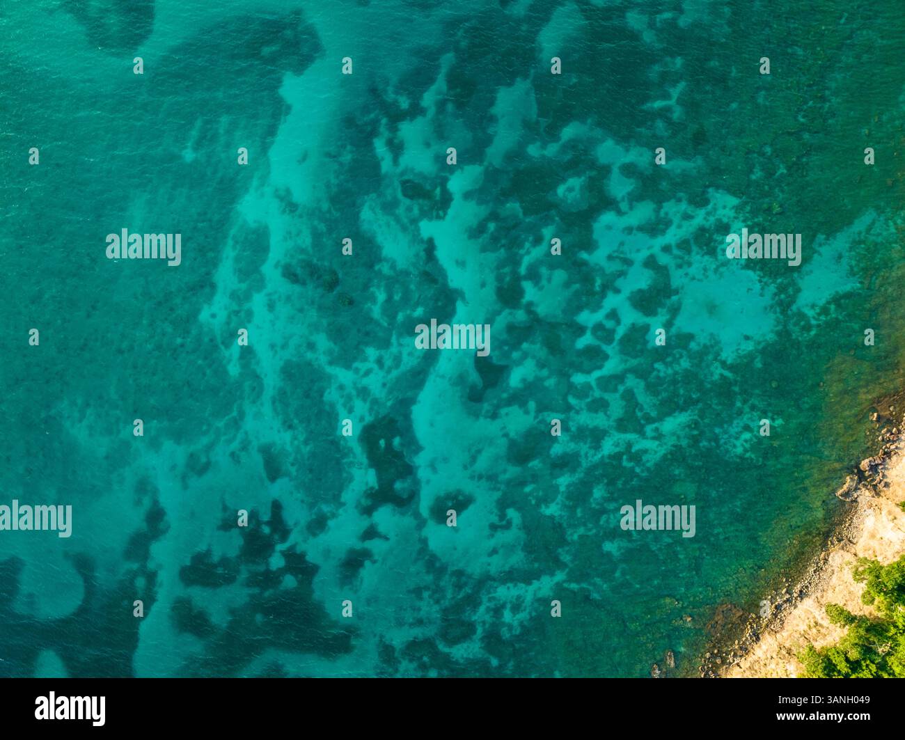 Aerial view of crystal clear water with reef along Providencia and ...
