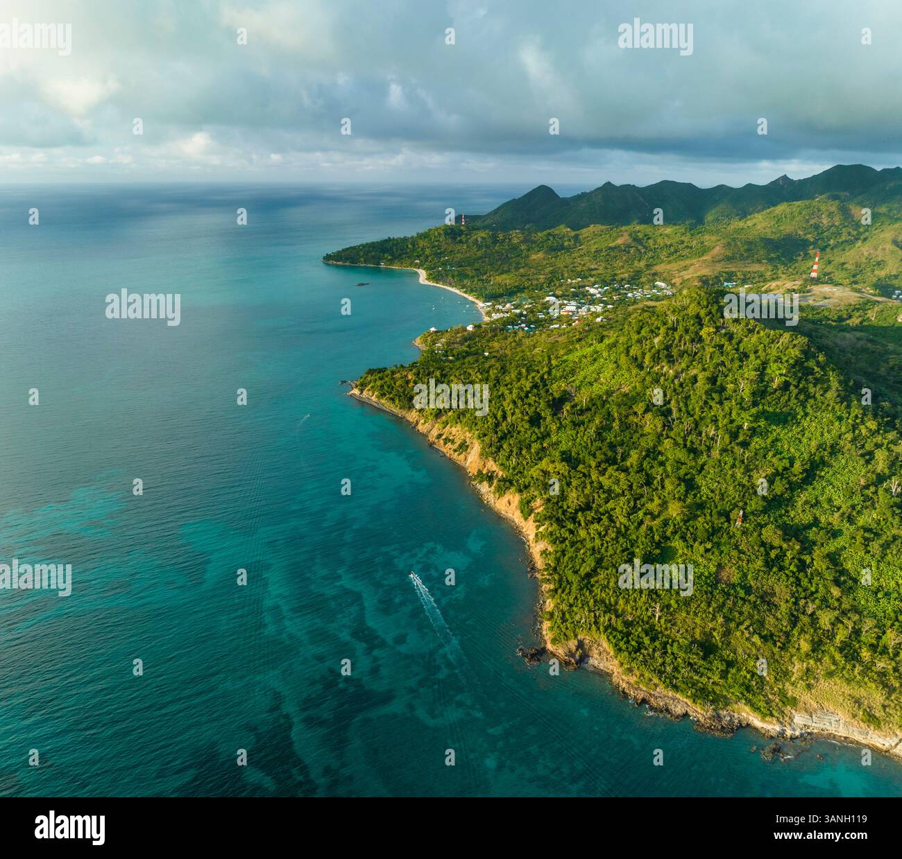Aerial view of a sailboat along the coastline on Providencia and Santa ...