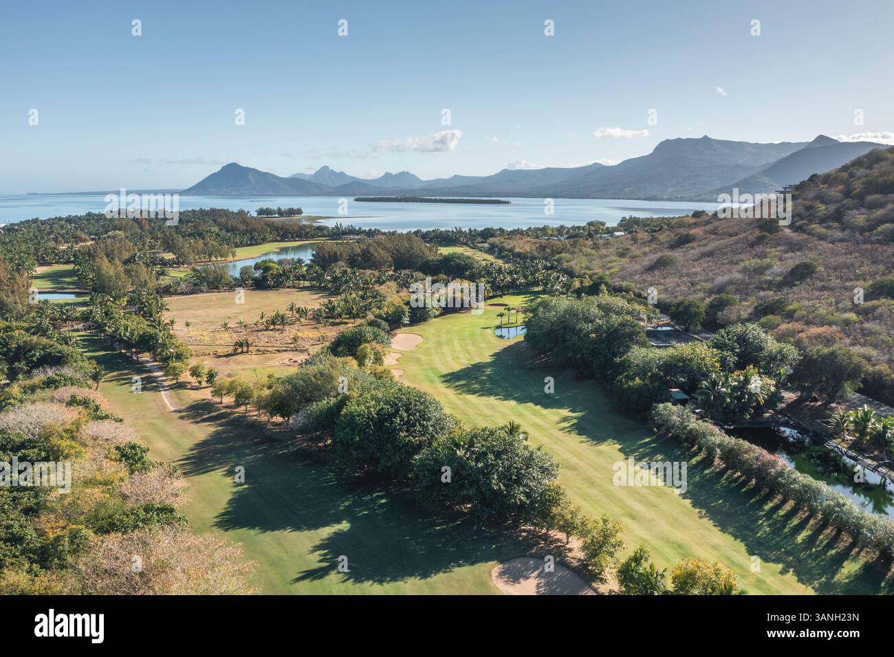 Aerial view of a golf court at sunrise, Rivière du Rempart, Mauritius ...