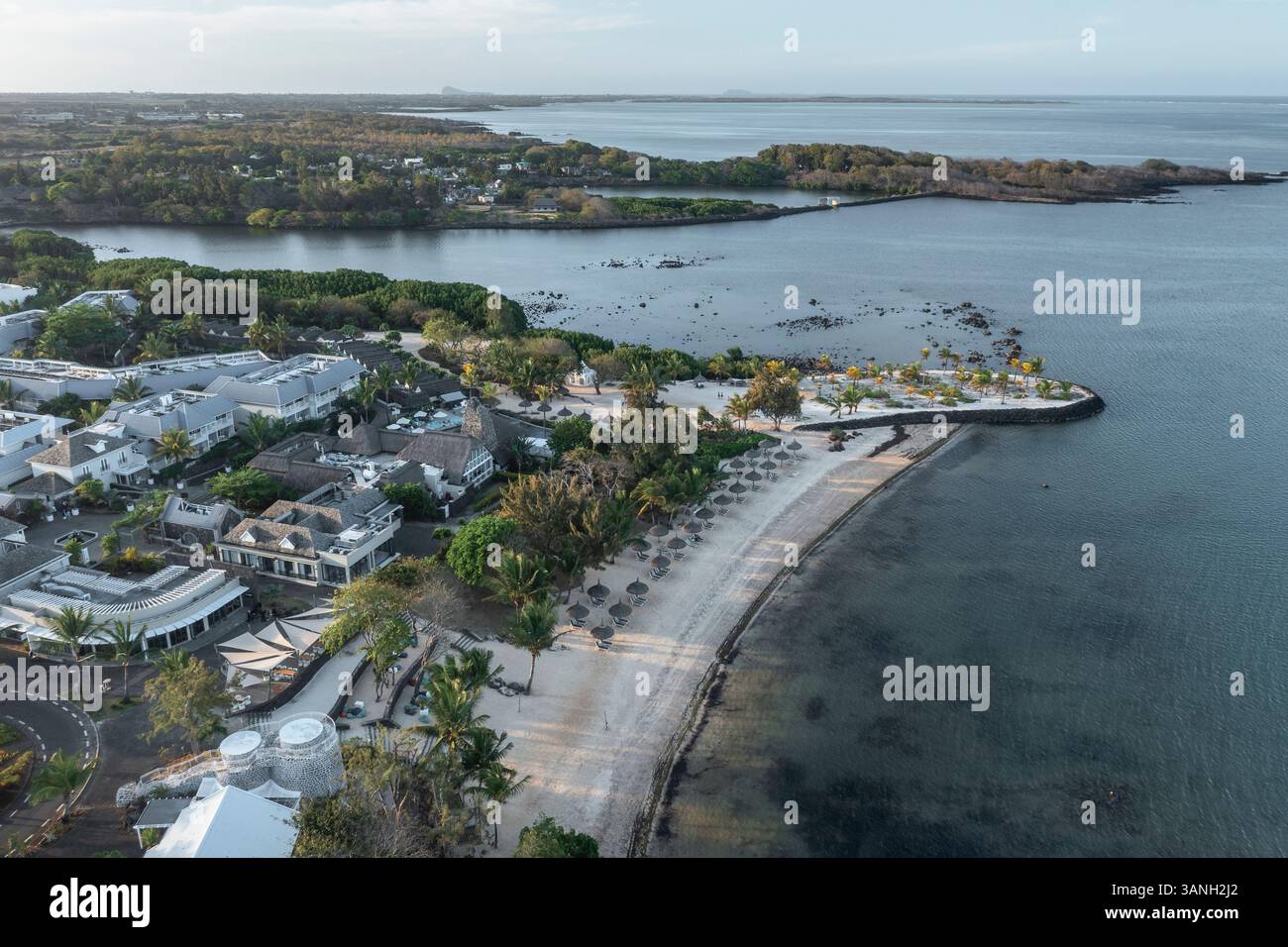Aerial view of a luxury resort along the coastline and Riviere du ...