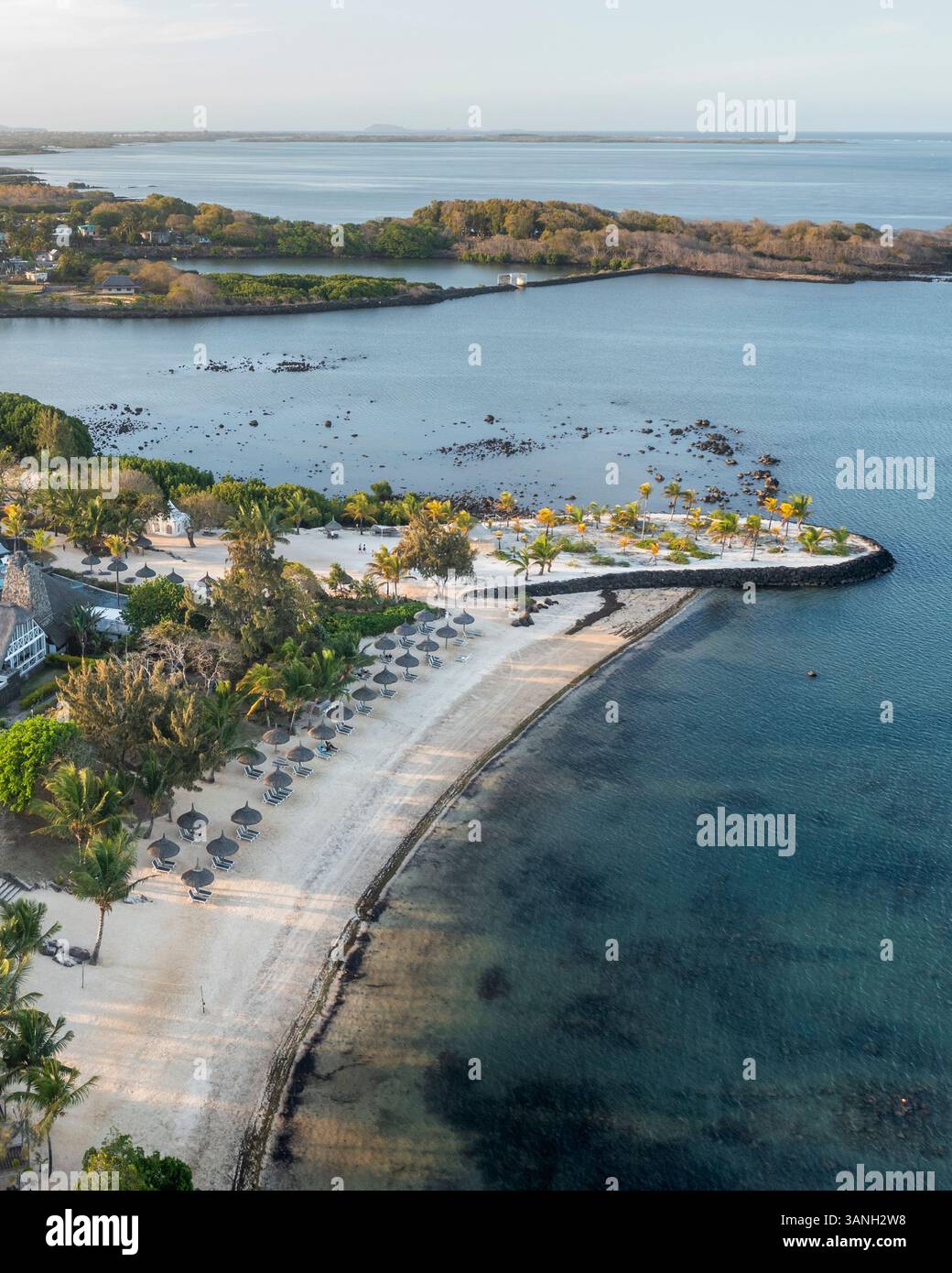 Aerial view of a luxury resort along the coastline and Riviere du ...