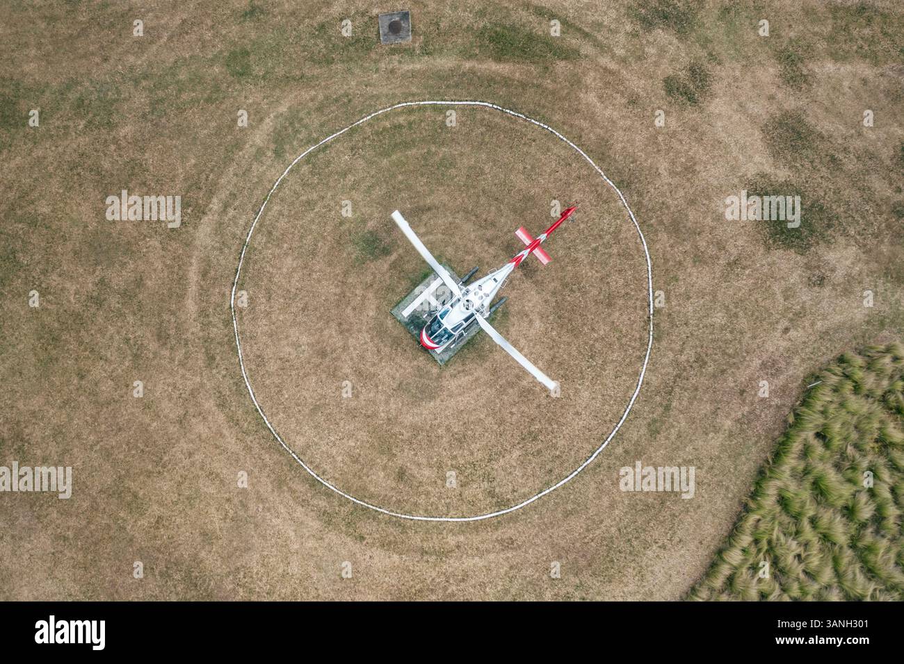 Aerial view of an helicopter ready for take off on a heliport in Bel ...