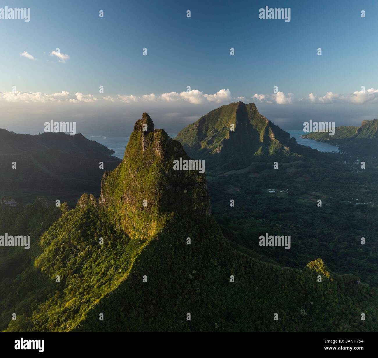 Aerial view of mountains peaks at sunset, Opunohu Bay, Moorea, French ...