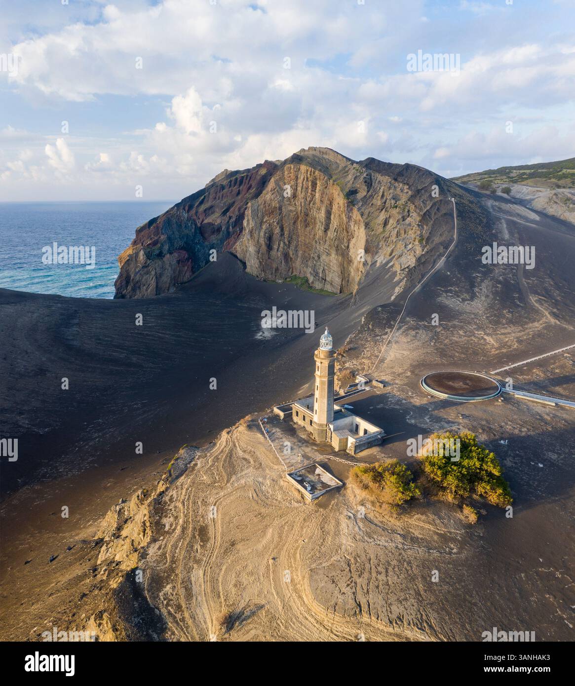 Aerial View of Farol da Ponta dos Capelinhos at sunset, Faial island ...