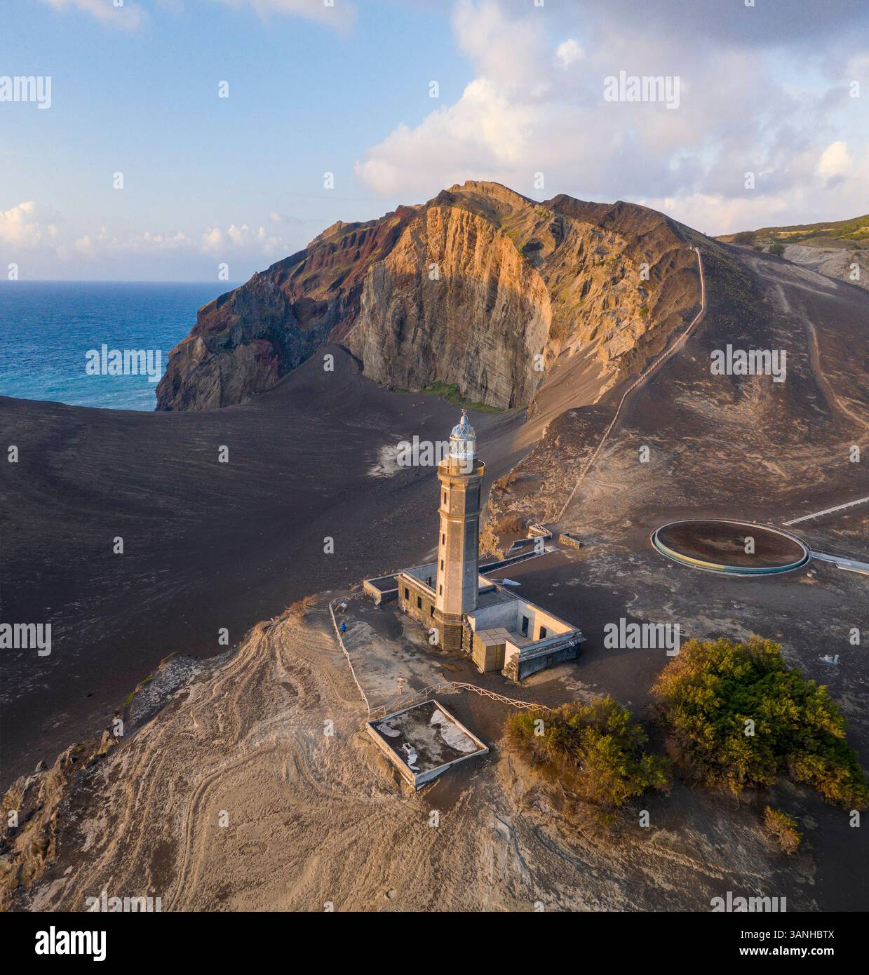 Aerial View of Farol da Ponta dos Capelinhos at sunset, Faial island ...