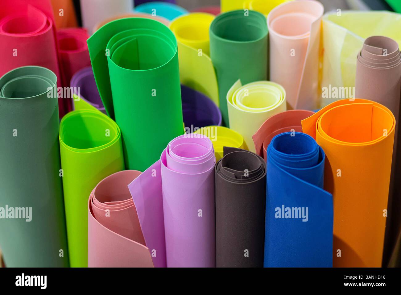 Color paper for creativity in rolls on a shop window Stock Photo - Alamy