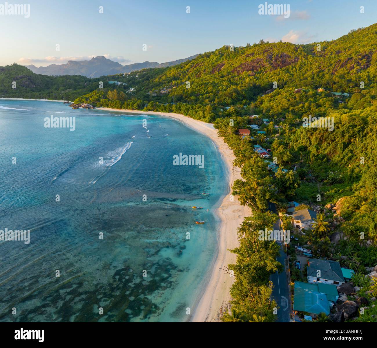 Aerial view of Baie Lazare beach along the coastline facing Lazare Bay ...