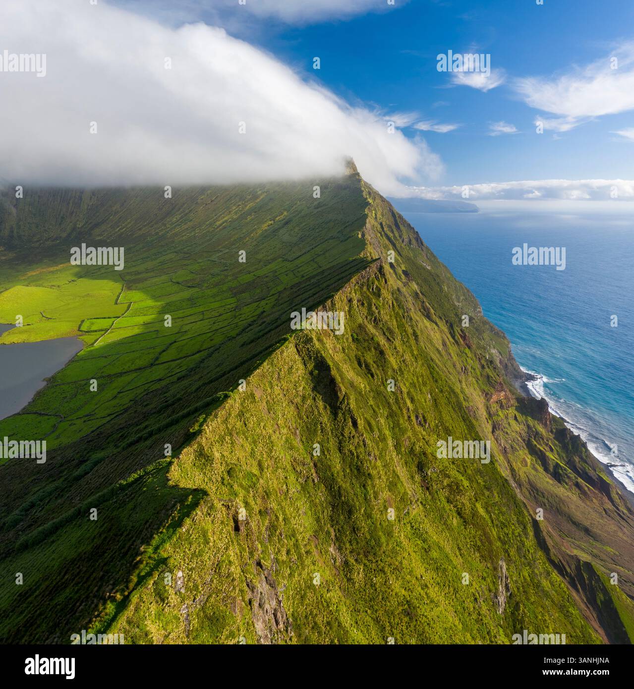 Aerial view of a sharp mountain ridge along the coastline facing the ...