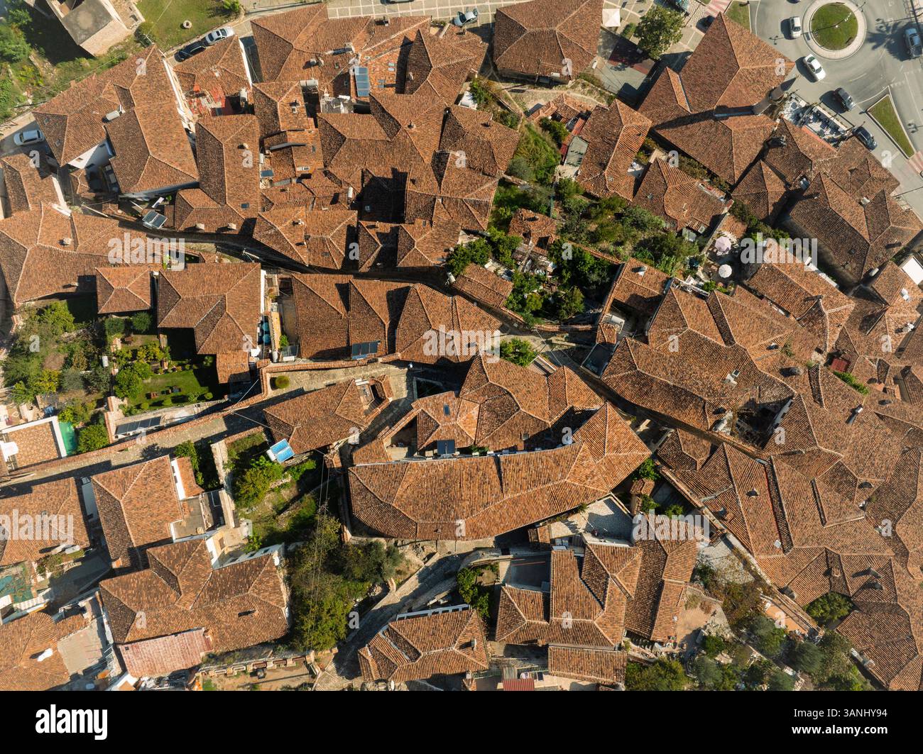 Aerial view of historic Mangalem with traditional stone buildings and ...