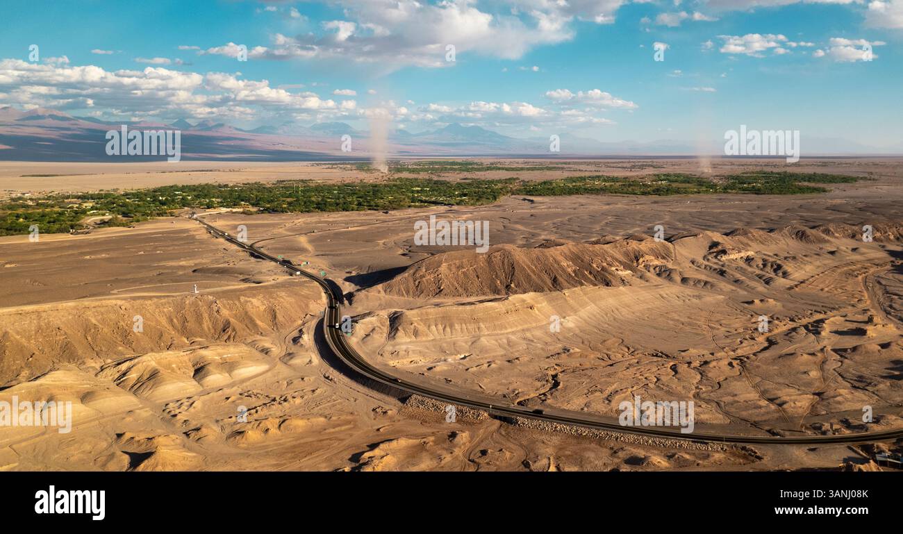 Aerial drone view of the city of San Pedro De Atacama with two sand ...