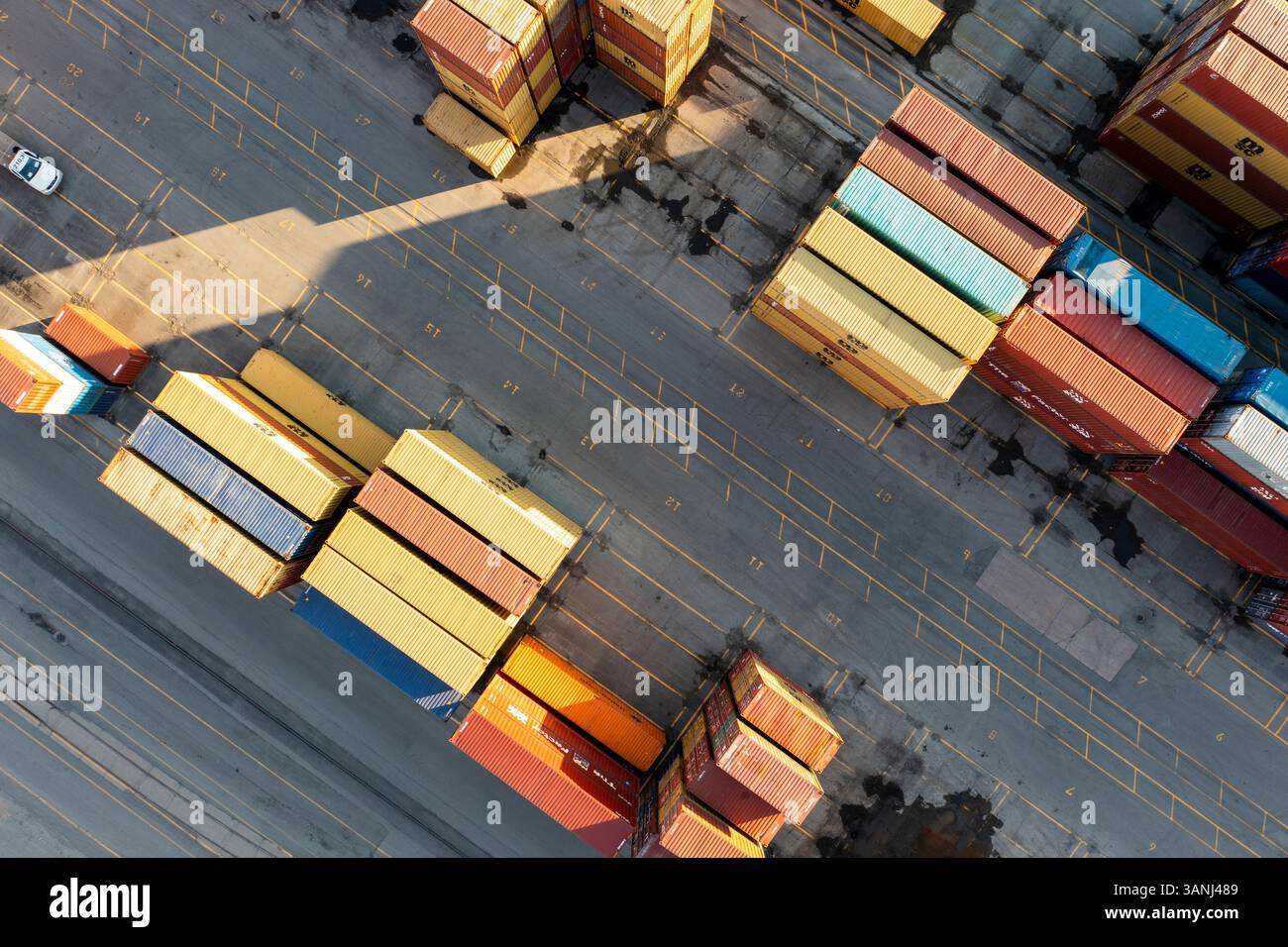 Aerial view of colorful shipping containers and cargo at the bustling ...