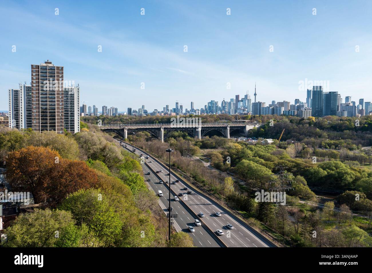 Aerial view of beautiful cityscape with highrise buildings, highway ...