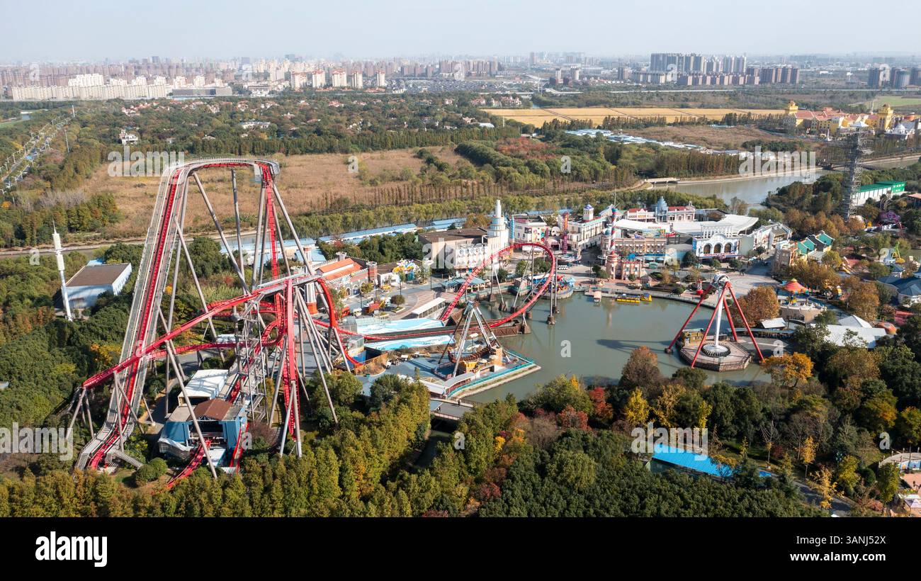 Aerial view of Songjiang Sheshan Hill amusement park with roller ...