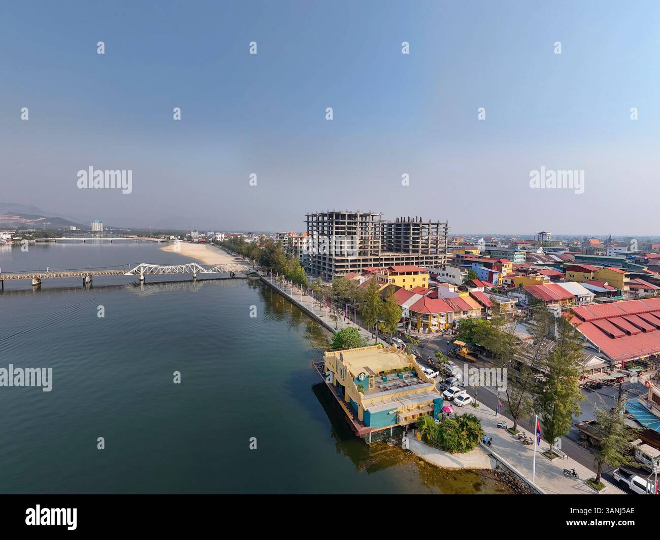 Aerial view of kampot riverside with old bridge and fish market, Tuek ...