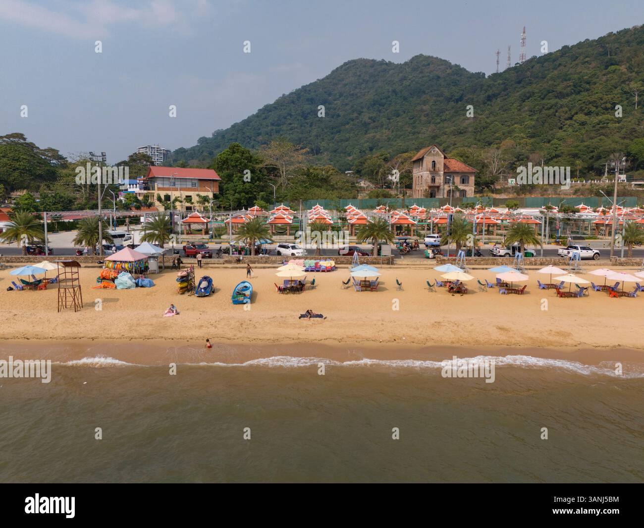 Aerial view of kep beach with tropical umbrellas and calm water, Prey ...