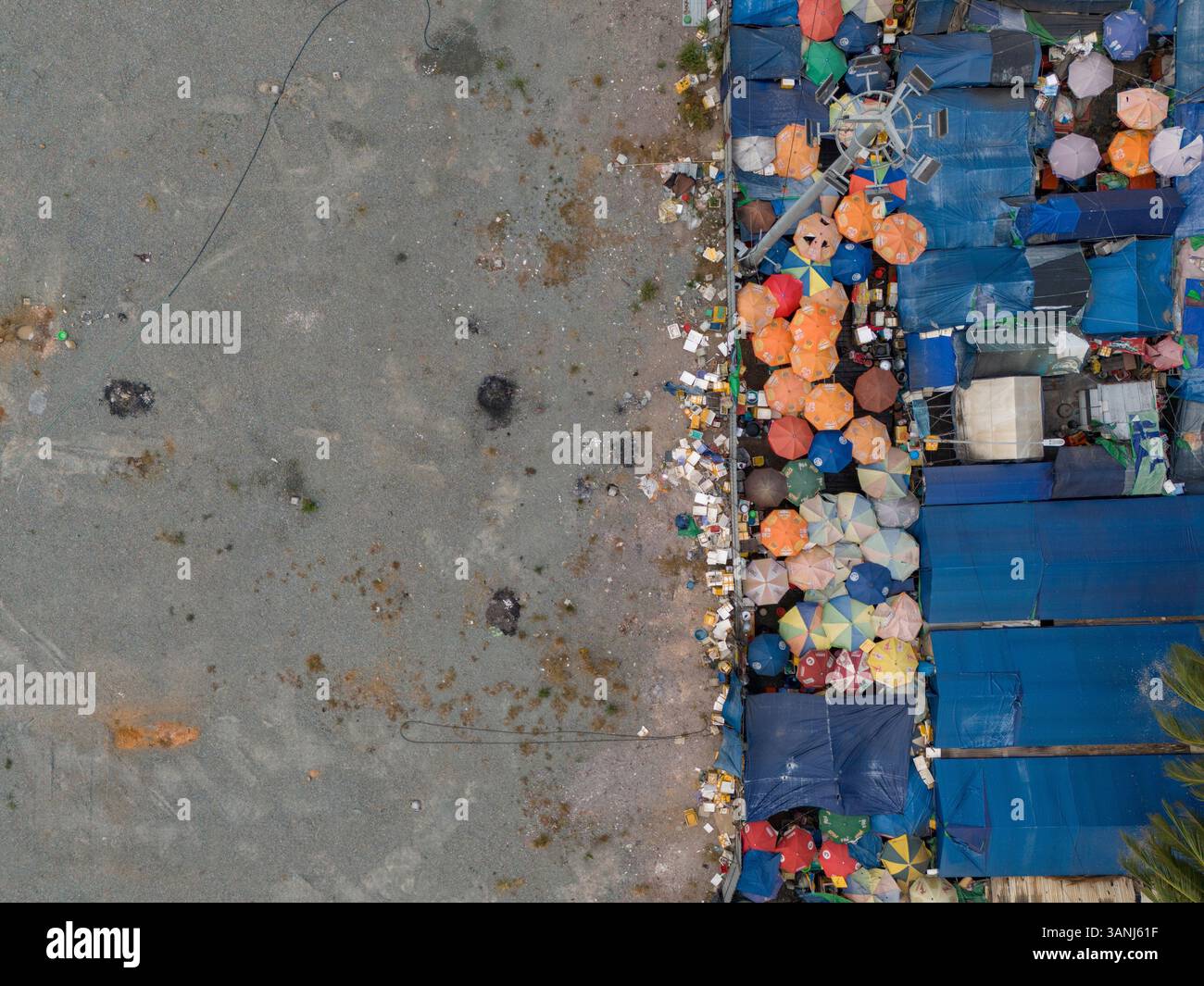 Aerial view of vibrant kep crab market with colorful umbrellas and ...