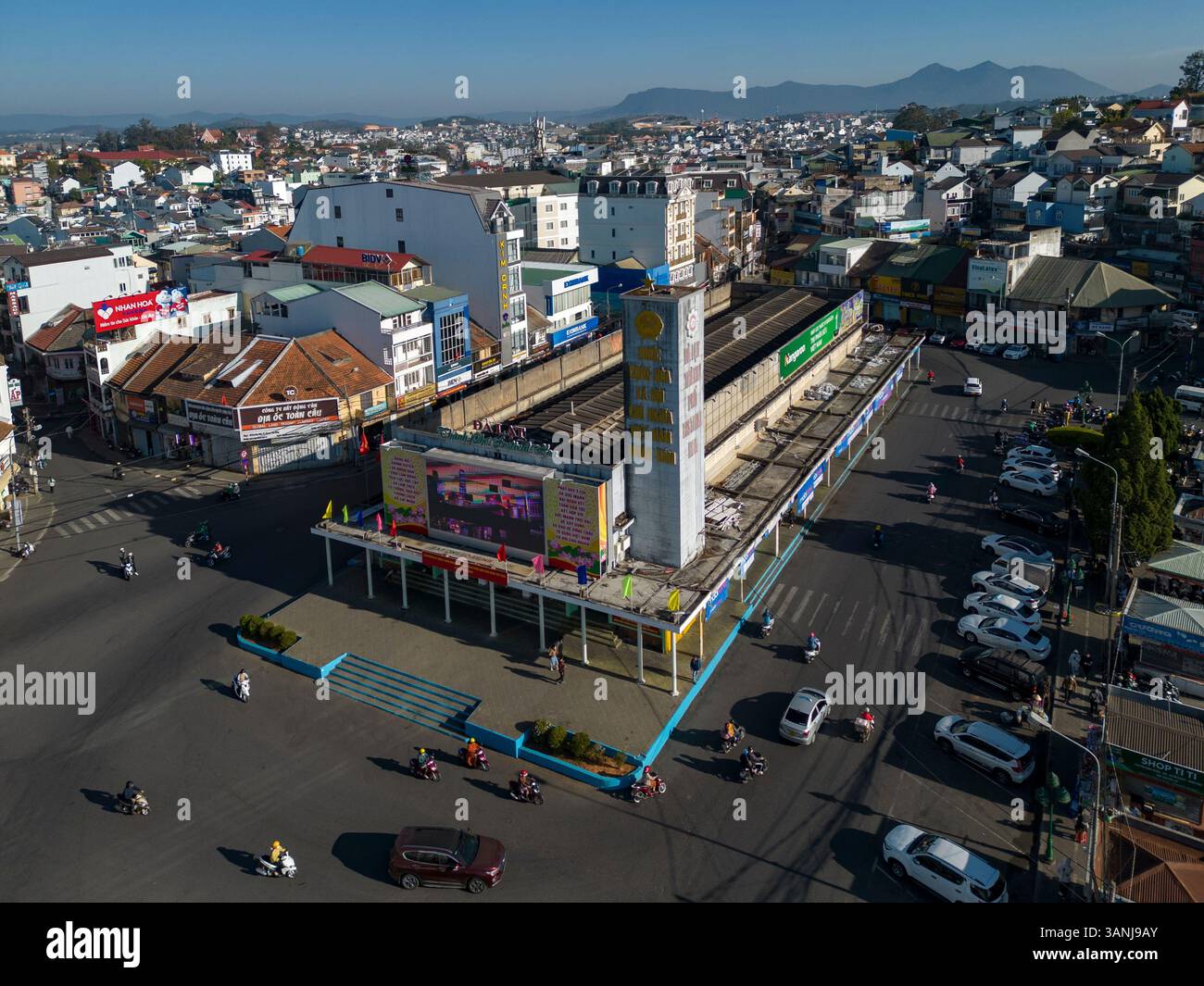 Aerial view of bustling cityscape with vibrant buildings and busy ...
