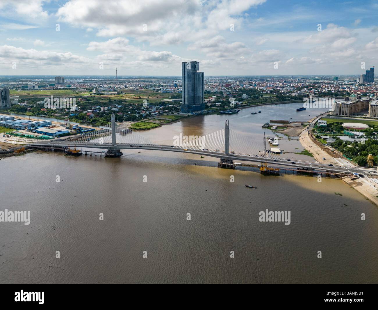 Aerial view of koh norea bridge over the river with modern skyscrapers ...