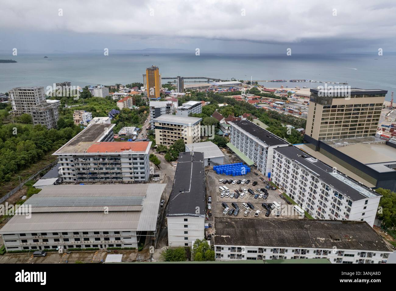 Aerial view of urban skyline with modern buildings and coastline ...
