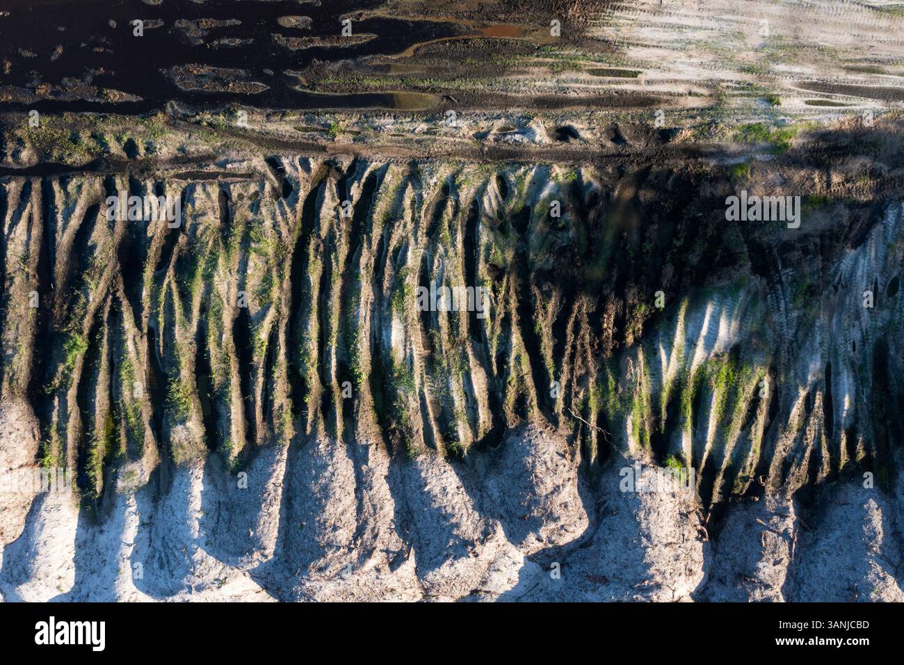 Aerial view of abstract natural patterns and textures of terrain with ...