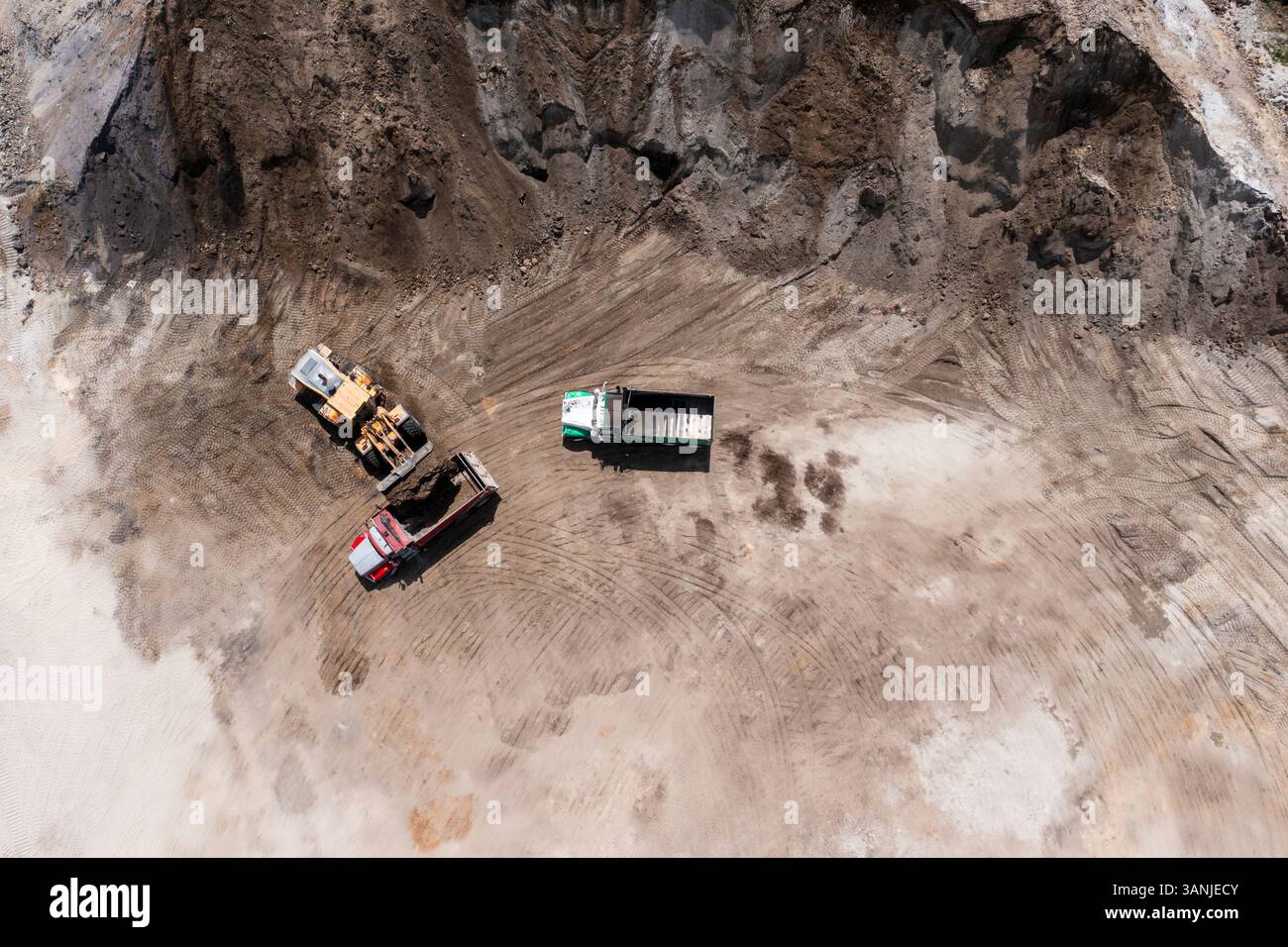 Aerial view of the construction site with powerful excavators and ...