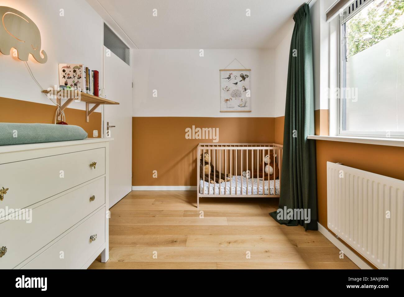 A serene nursery featuring a stylish crib, warm color palette, and ...
