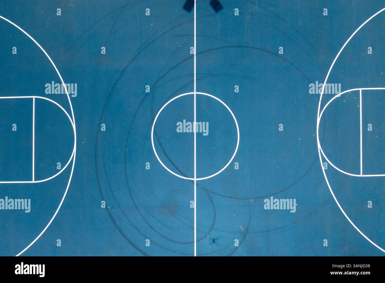Aerial view of basketball court with geometric patterns and lines in ...
