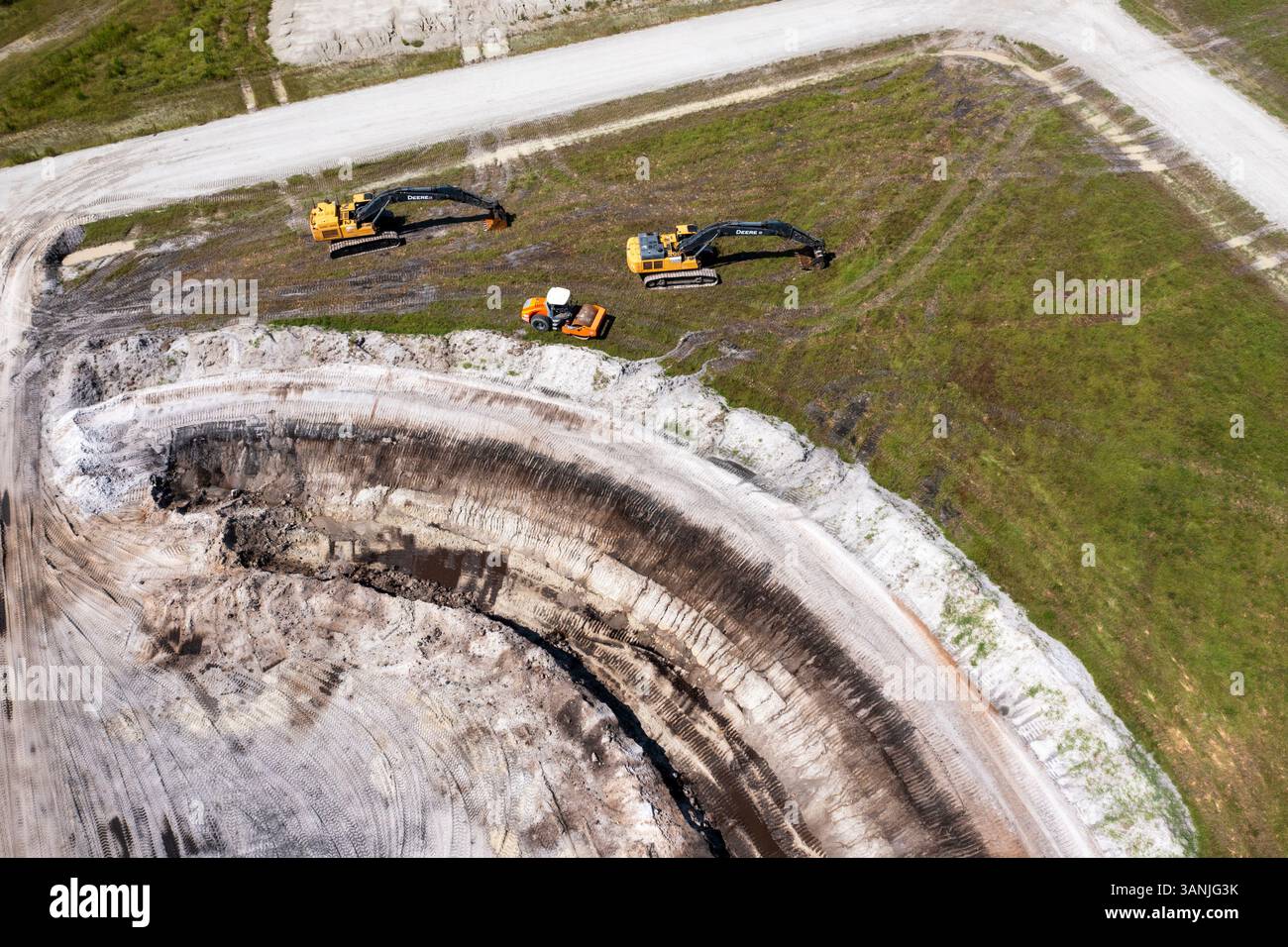 Aerial view of Sunshine Mine construction site with excavators and ...