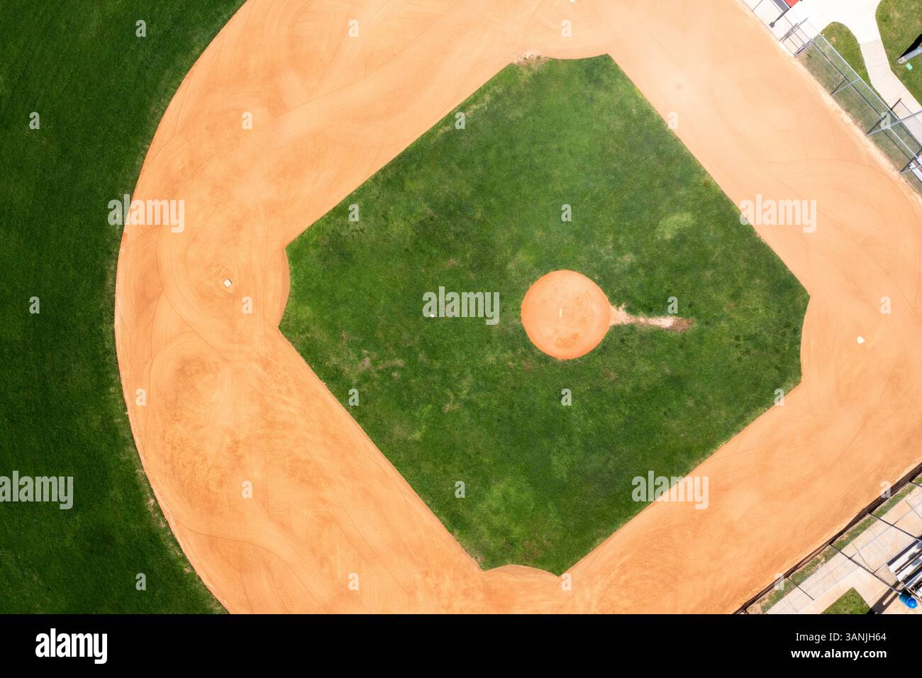 Aerial view of baseball field surrounded by grass and sand in Knecht ...