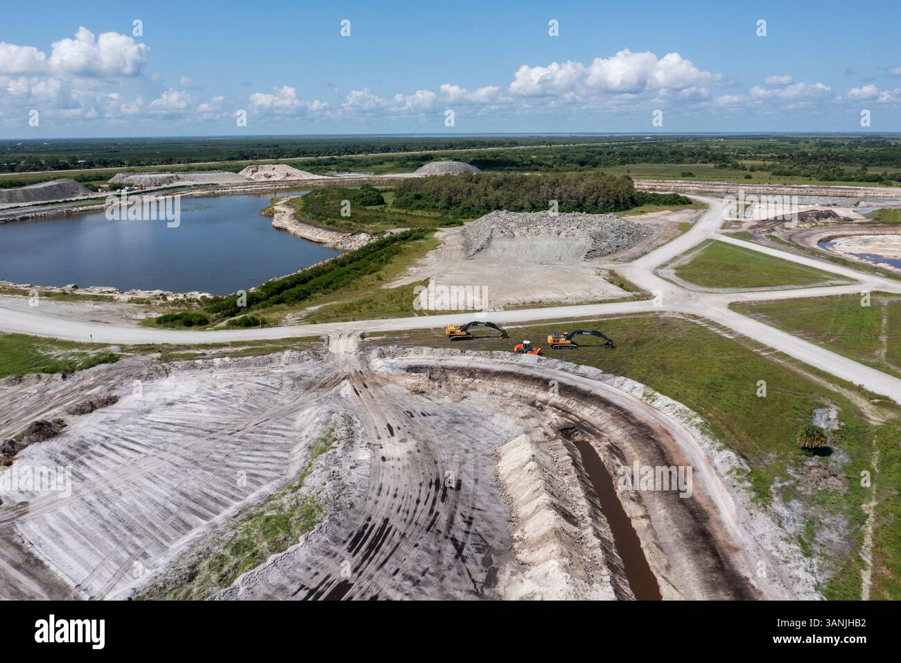 Aerial view of Sunshine Mine with surrounding lake and industrial ...