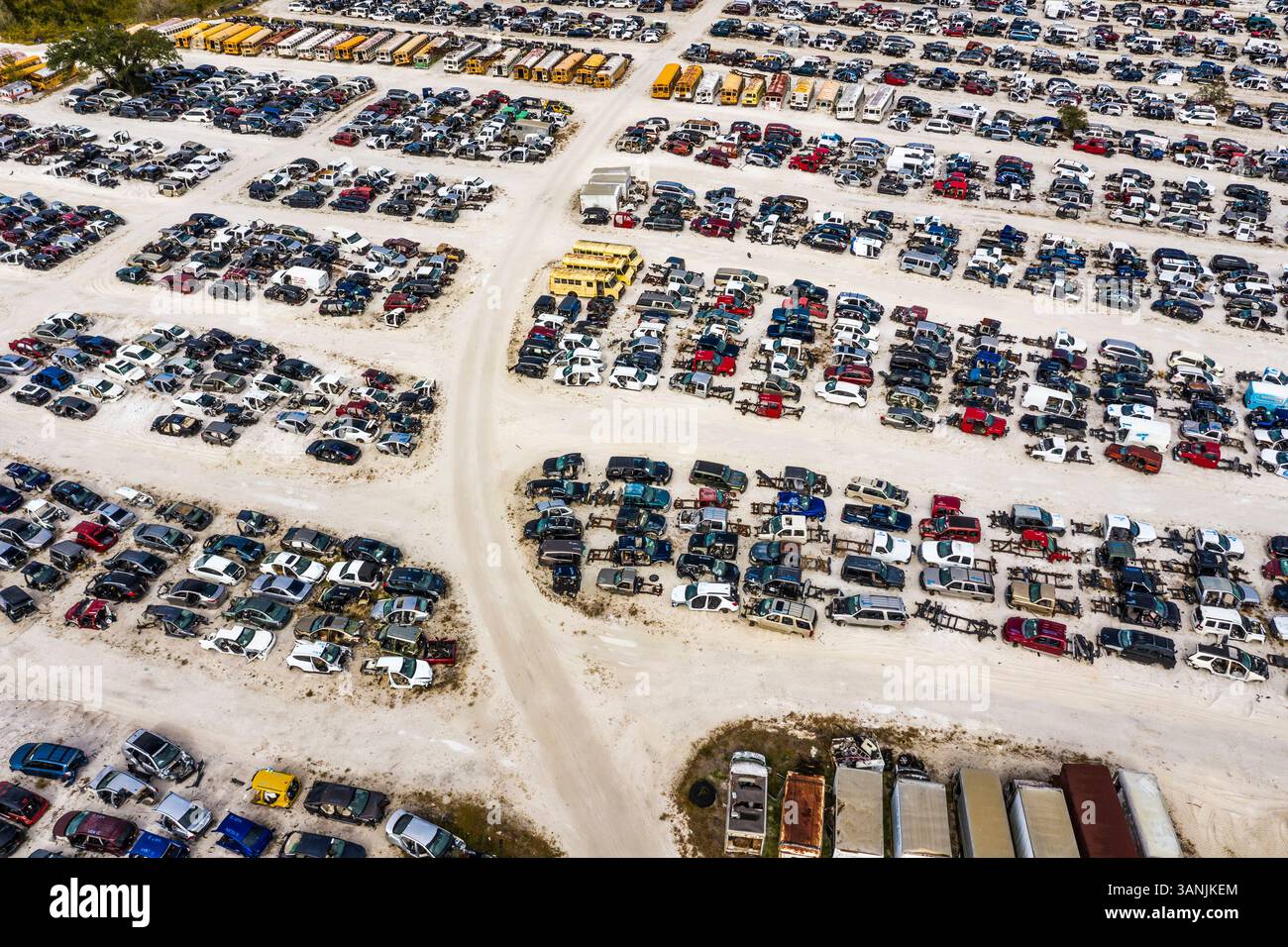 Aerial view of many vehicles in a car park junkyard, Palmdale, Florida ...