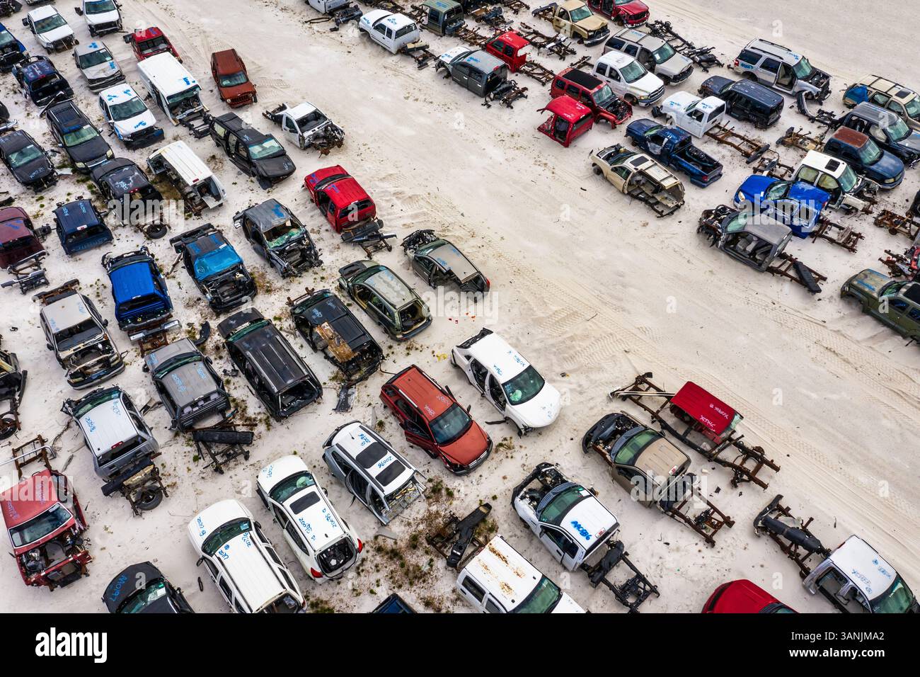 Aerial view of many vehicles in a car park junkyard, Palmdale, Florida ...
