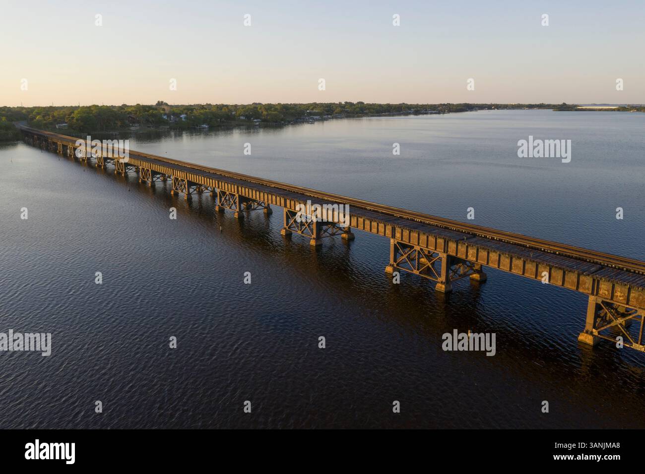 Aerial view of a railroad bridge crossing St. Sebastian River in ...
