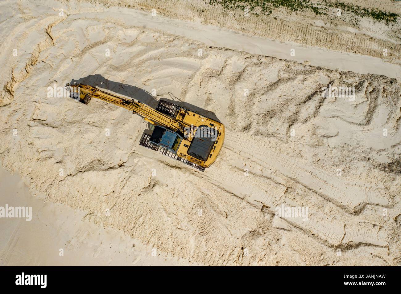 Aerial view of a crane operating in a water treatment facility at ...