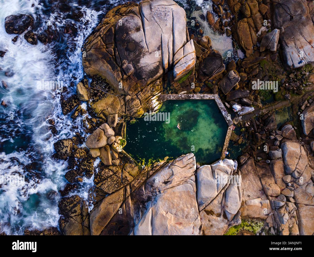 Aerial view of Saunders Rock tidal pool in summer at Bantry Bay ...