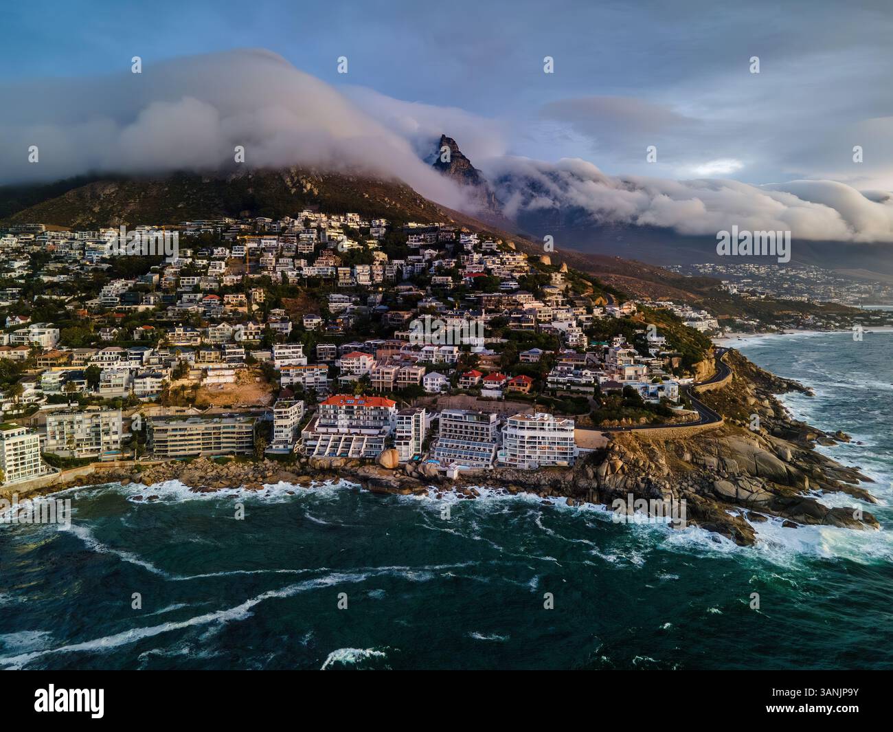 Aerial view of Bantry Bay and low cloud over Lion’s Head Mountain with ...