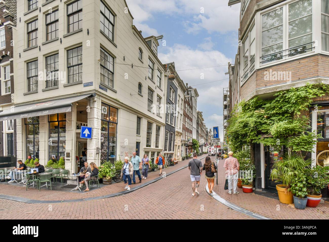 A picturesque street in Amsterdam featuring historic architecture ...